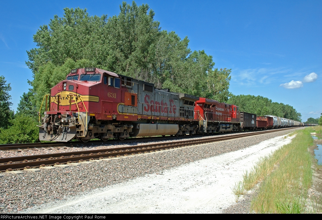 ATSF 631, GE C44-9W, an unpatched Warbonnet leads a CP EVO westbound on the Creston Sub